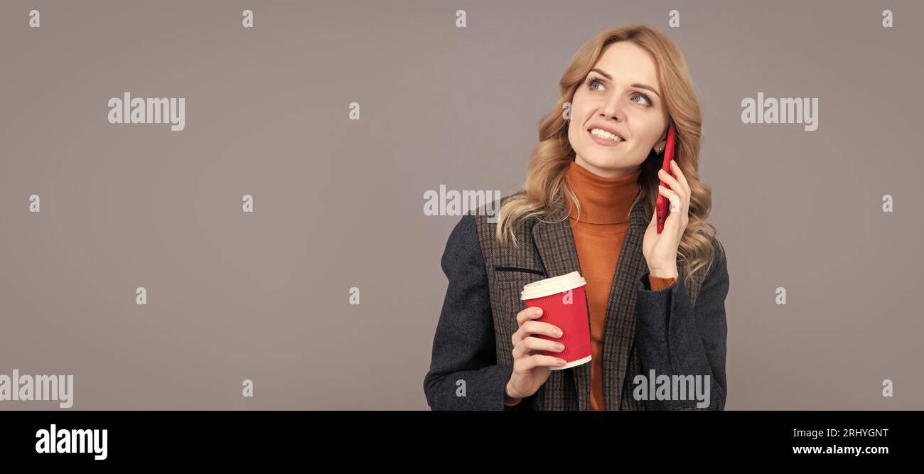 Woman with coffee cup. Chattering girl talk on mobile phone drinking ...