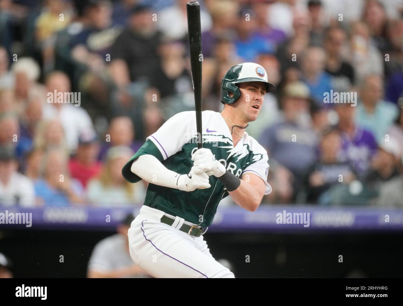 Colorado Rockies' Nolan Jones watches his two-run single off Chicago ...
