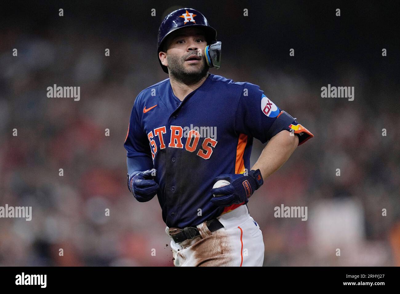 Houston Astros' Jose Altuve returns to the dugout after his 2,000th ...