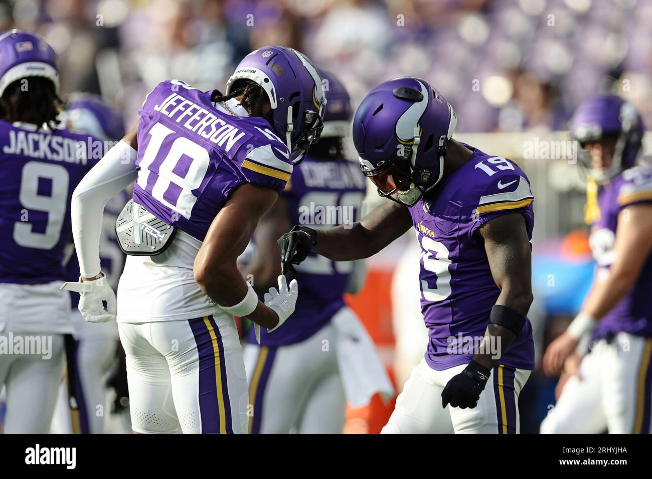 Minnesota Vikings wide receivers Justin Jefferson (18) and Brandon Powell (19) greet on the ...