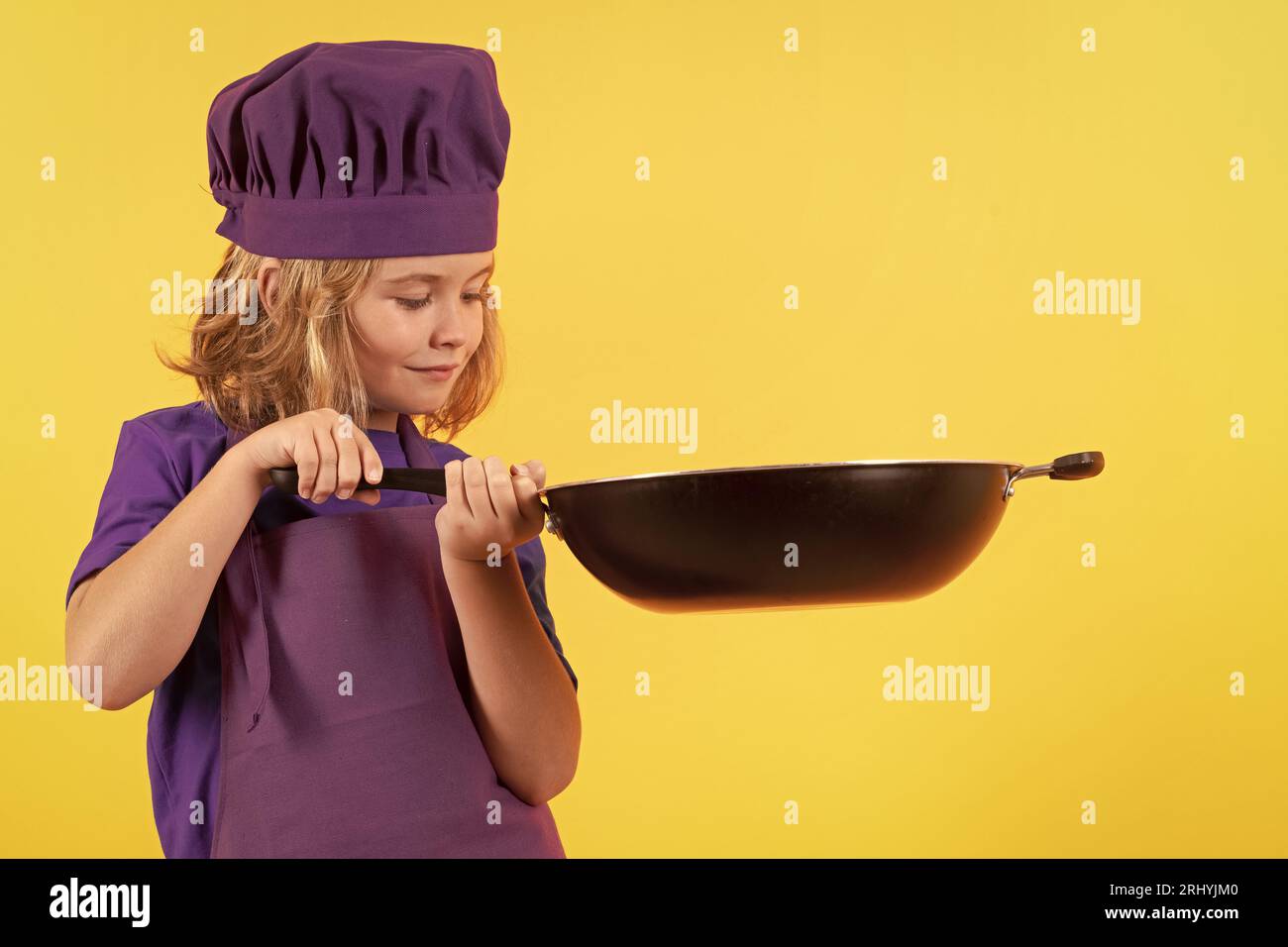 Kid cook with cooking pan. Child in cook uniform. Chef kid isolated on ...