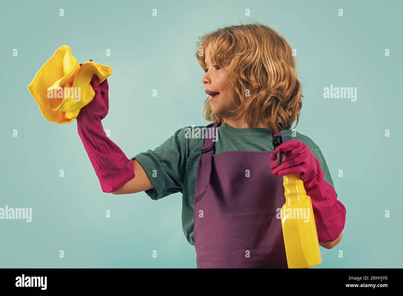 Child cleans at home concept. Kid cleaning with mop to help with ...