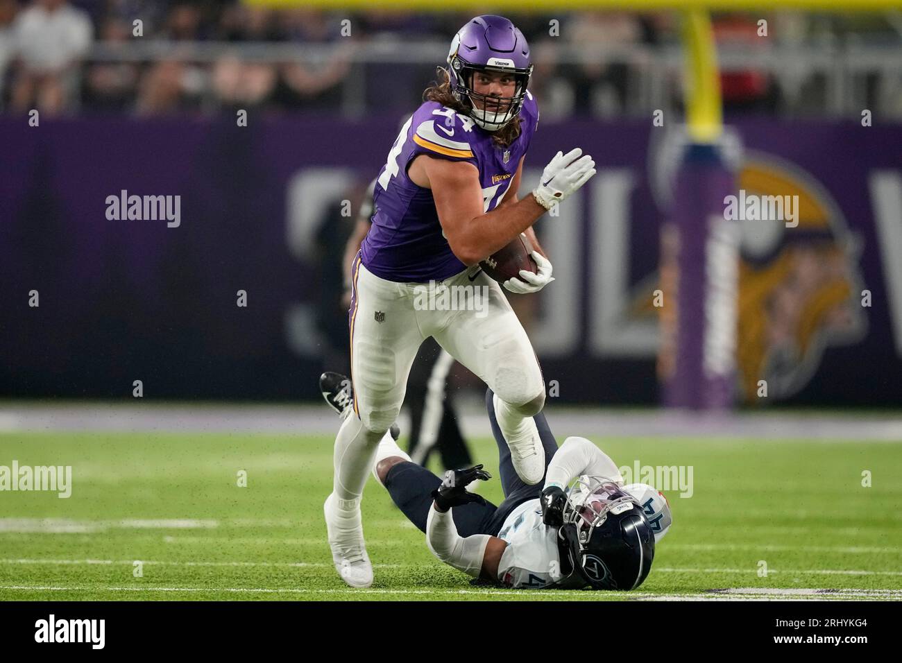 Minnesota Vikings tight end Nick Muse (34) breaks a tackle attempt by ...