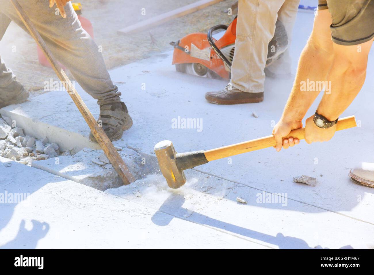 Concrete sidewalk demolition leads to repair pavement construction work ...