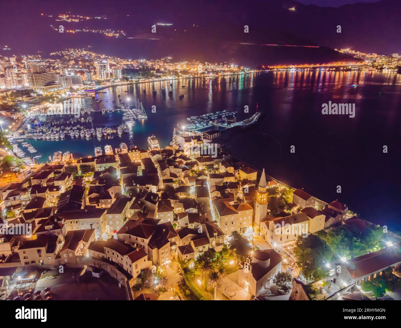 Budva city lights from Montenegro seen from above. Night view. Drone ...