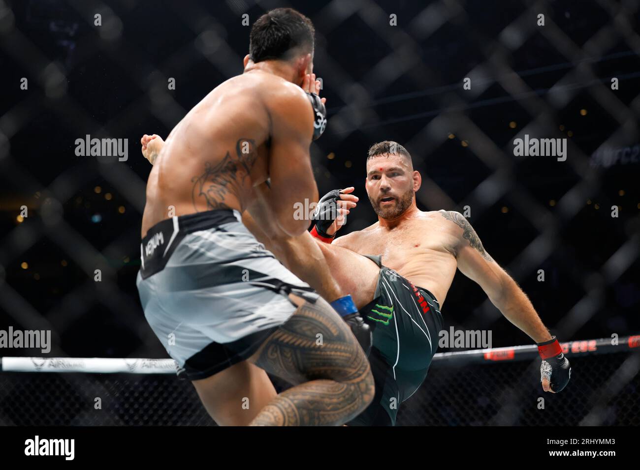Chris Weidman pursues Brad Tavares during a UFC 292 mixed martial arts ...