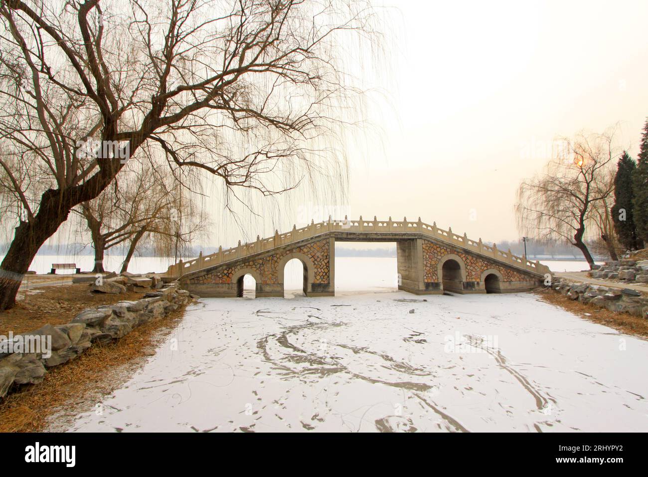 Ancient stone arch bridge in Old summer palace ruins park, Beijing ...