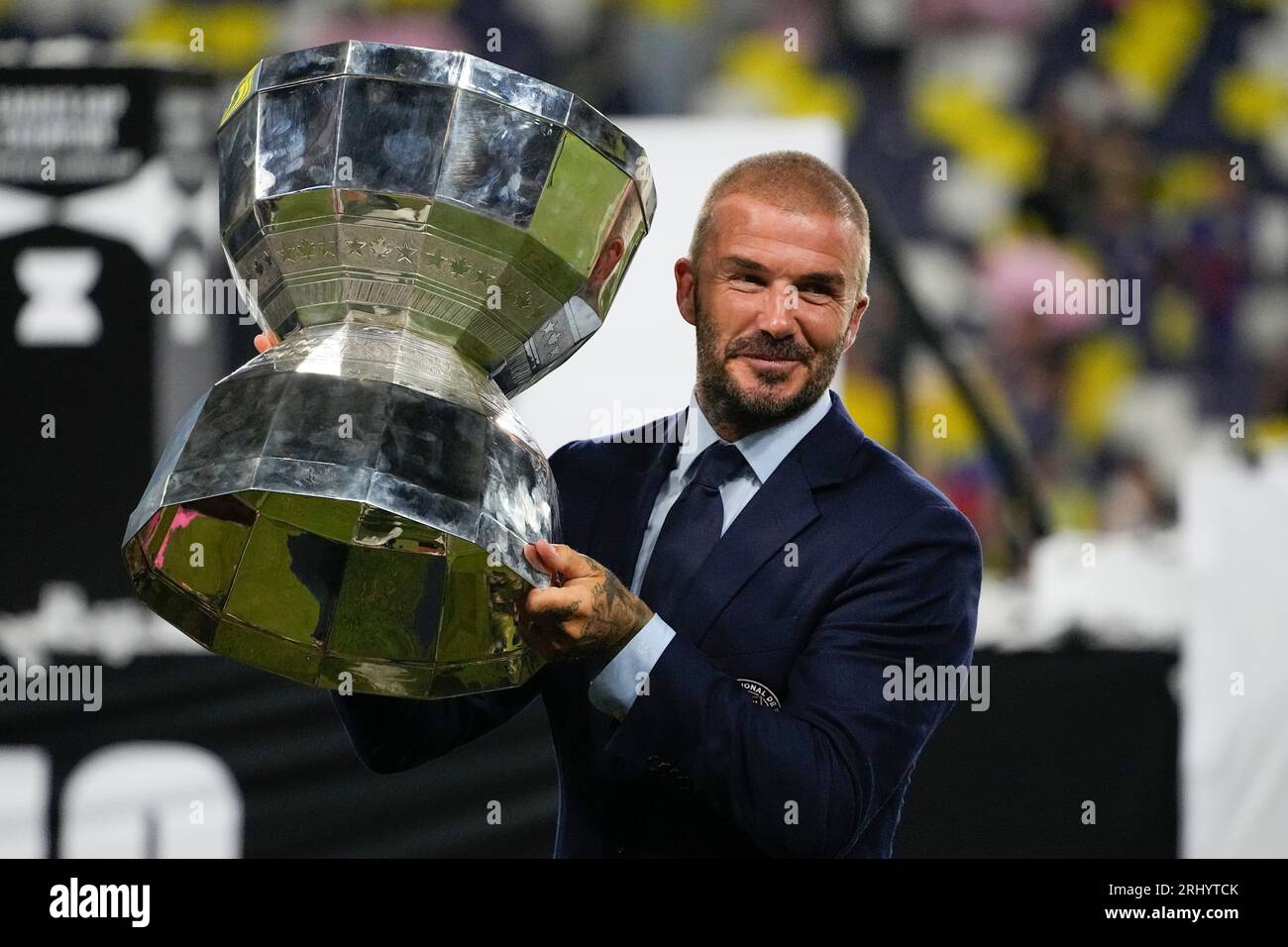 Inter Miami co-owner David Beckham holds the trophy after the team's ...
