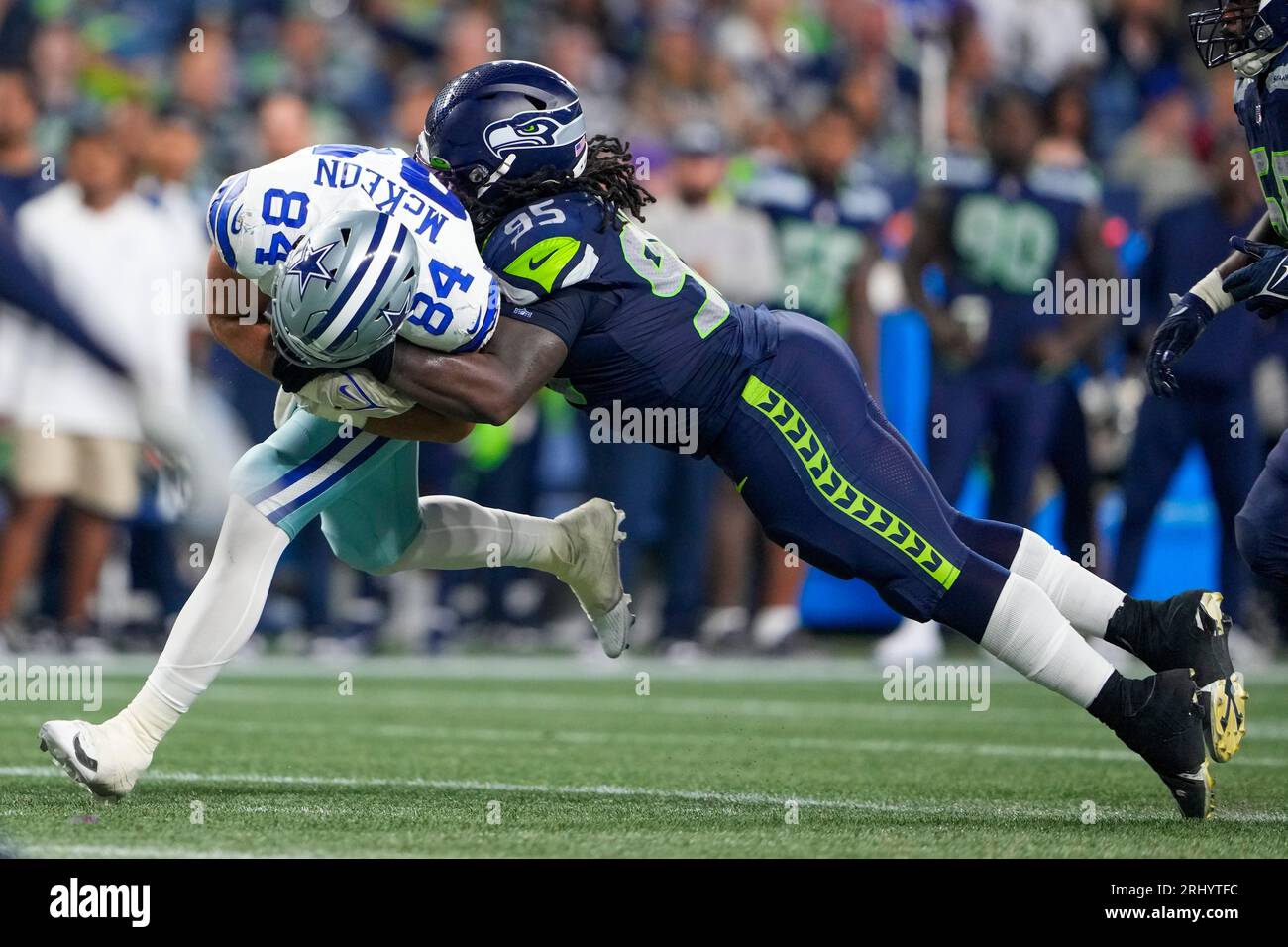 Dallas Cowboys tight end Sean McKeon is tackled by Seattle Seahawks ...