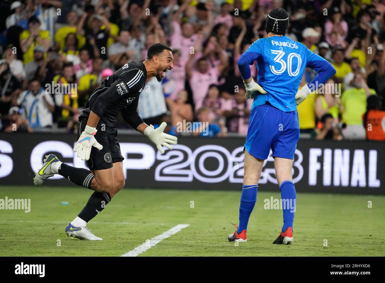 Inter Miami goalkeeper Drake Callender, left, runs past Nashville SC ...