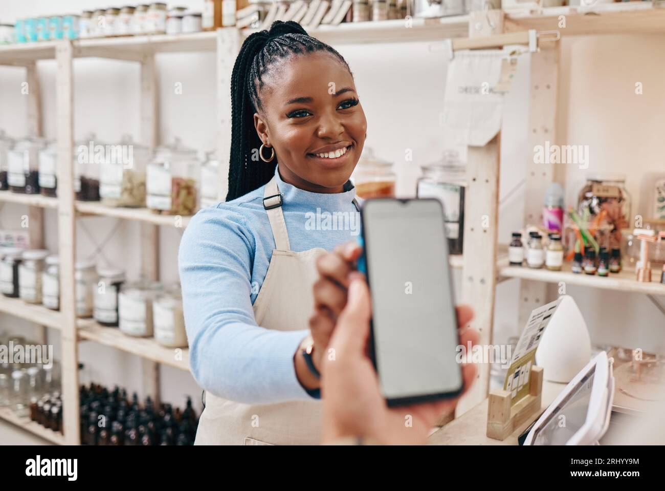 Customer, black woman and payment with smartphone screen, finance and ...