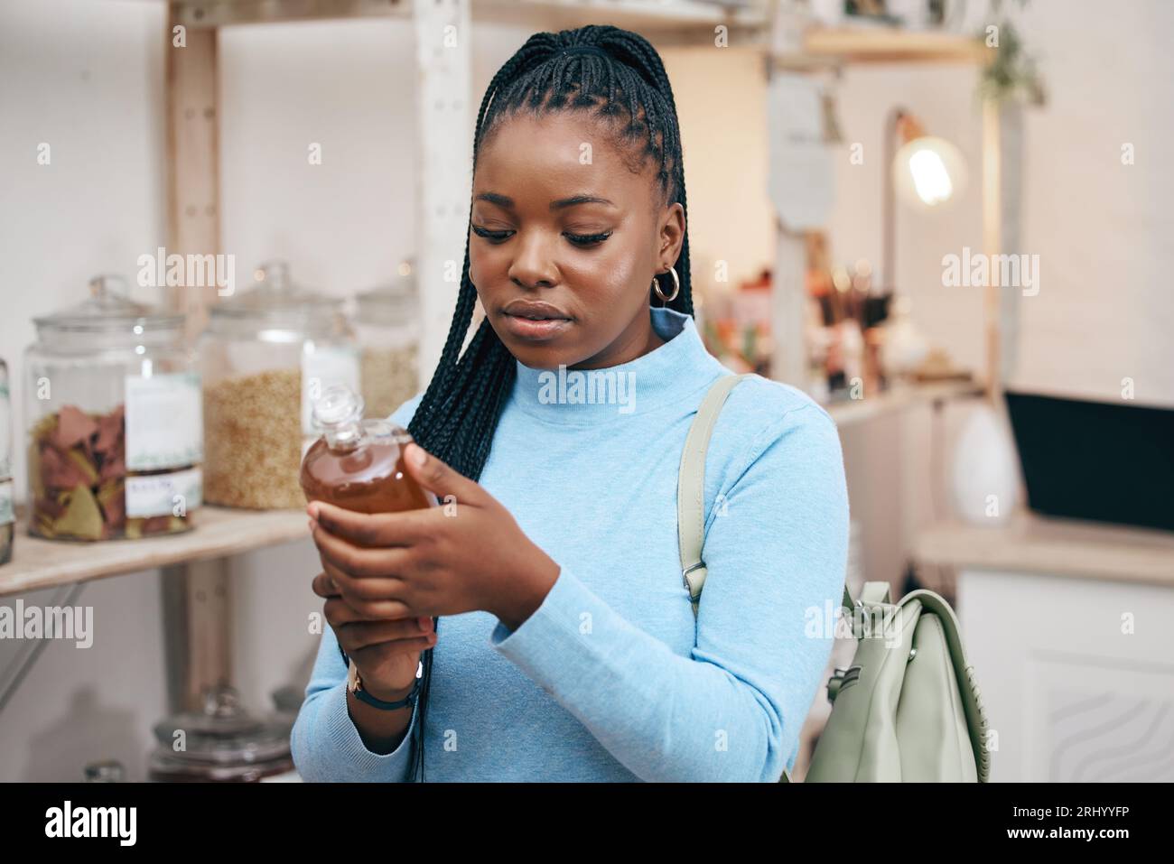 Woman, shopping and reading jar ingredients in grocery store for ...