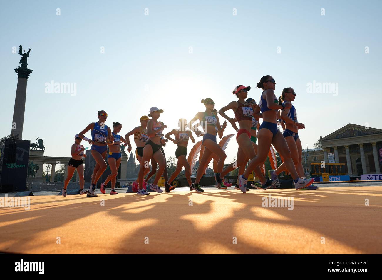 Race walkers compete past Heroes' Square in the women's 20-kilometer ...
