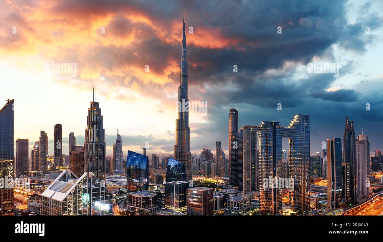 Dubai skyline at sunset with Burj Khalifa - aerial view, United Arab ...