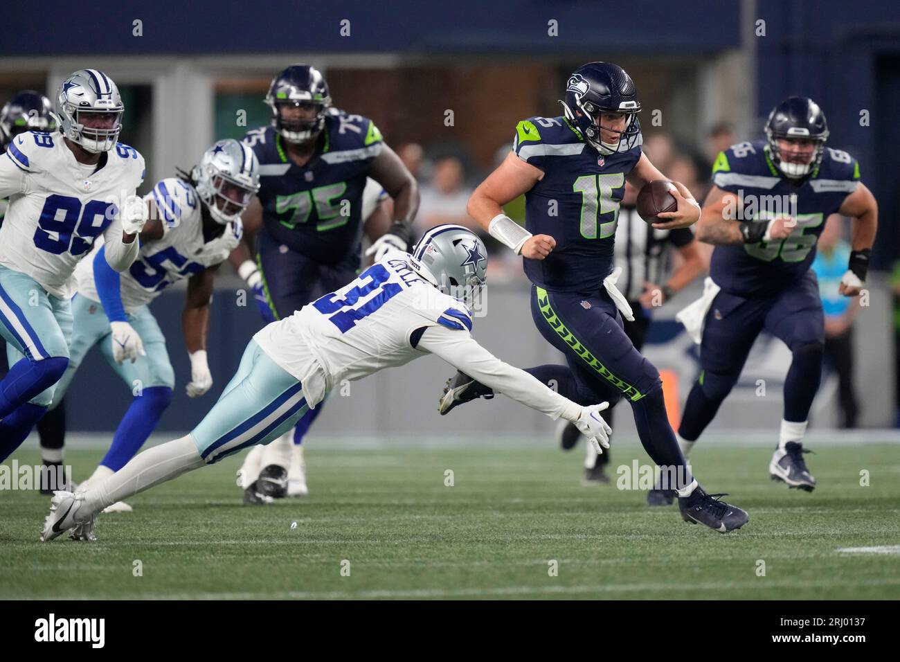 Seattle Seahawks quarterback Holton Ahlers (15) runs with the ball ...