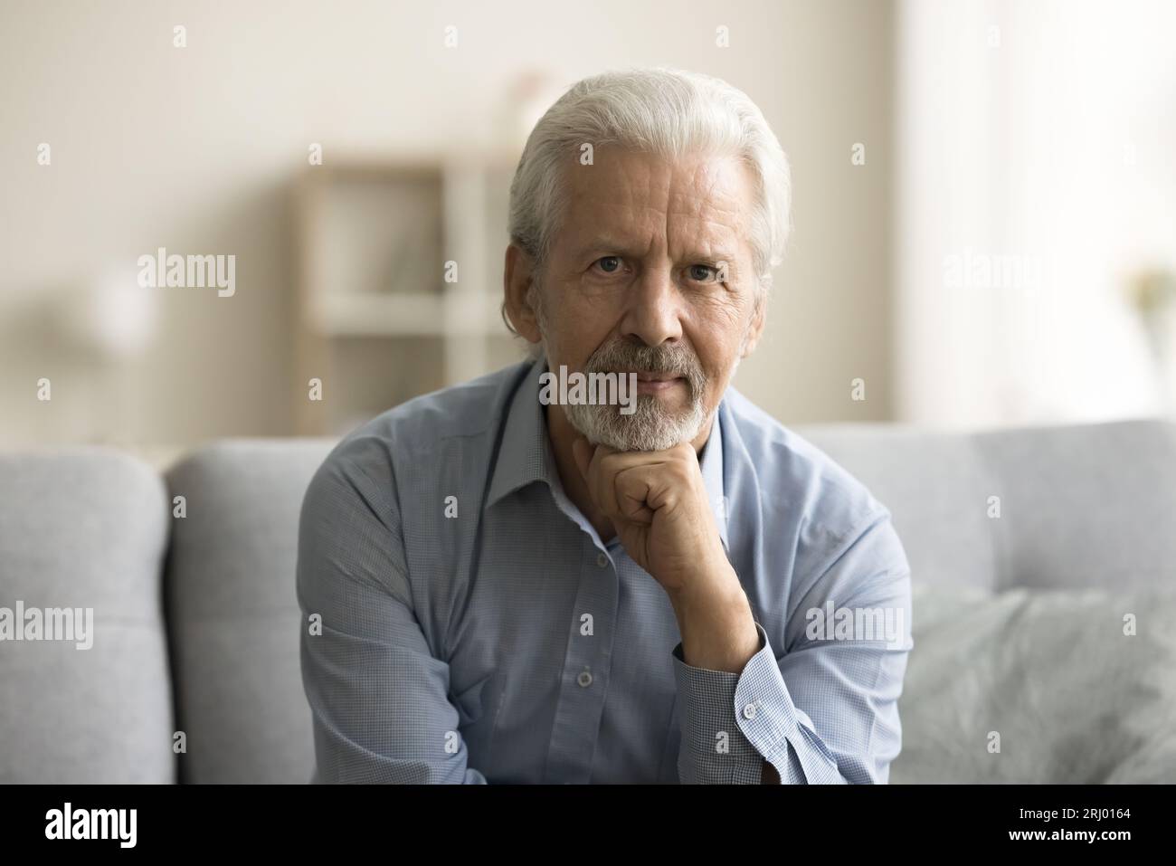 Serious confident senior retired man looking at camera Stock Photo - Alamy