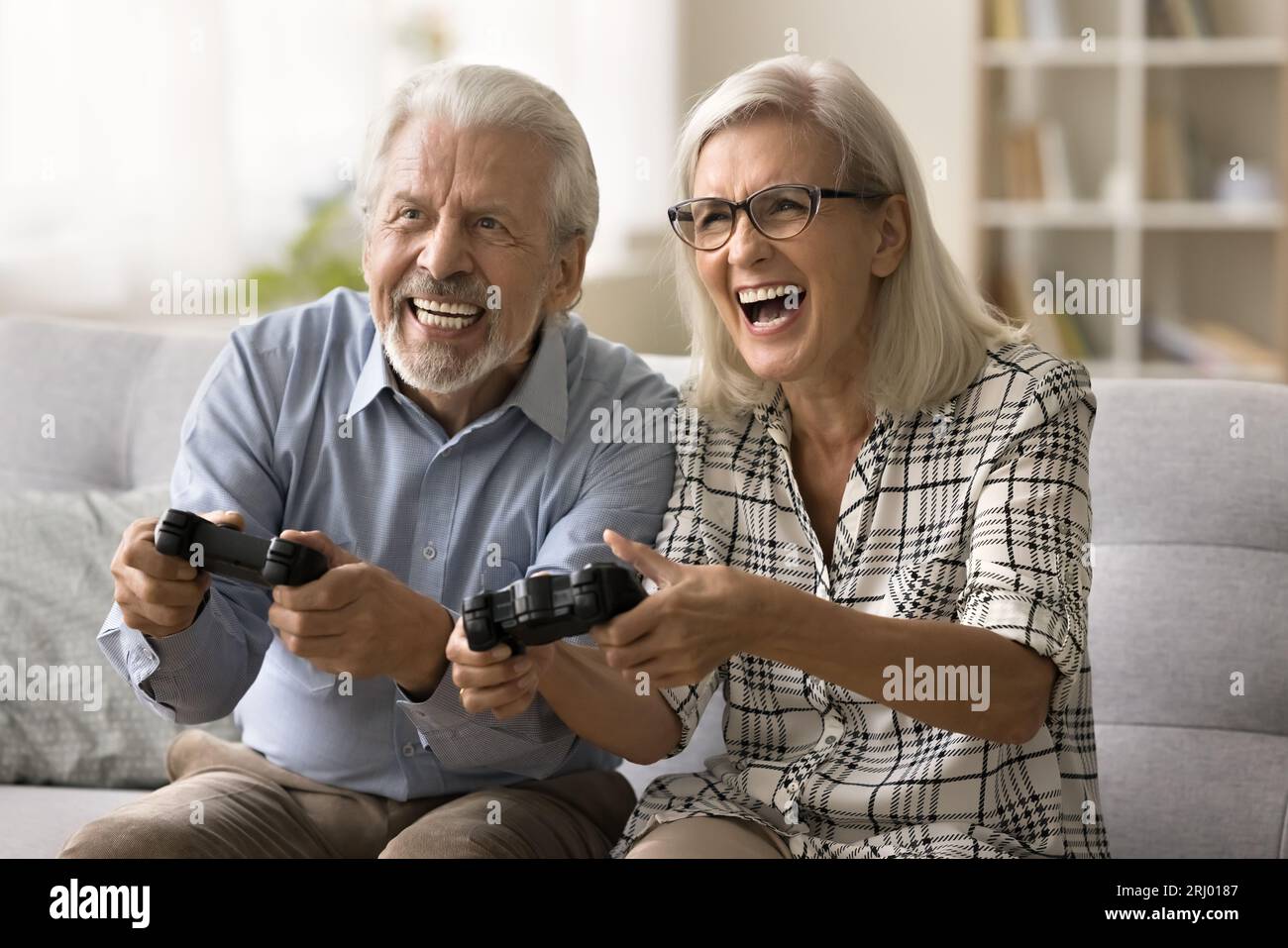 Older man playing computer game hi-res stock photography and images - Alamy
