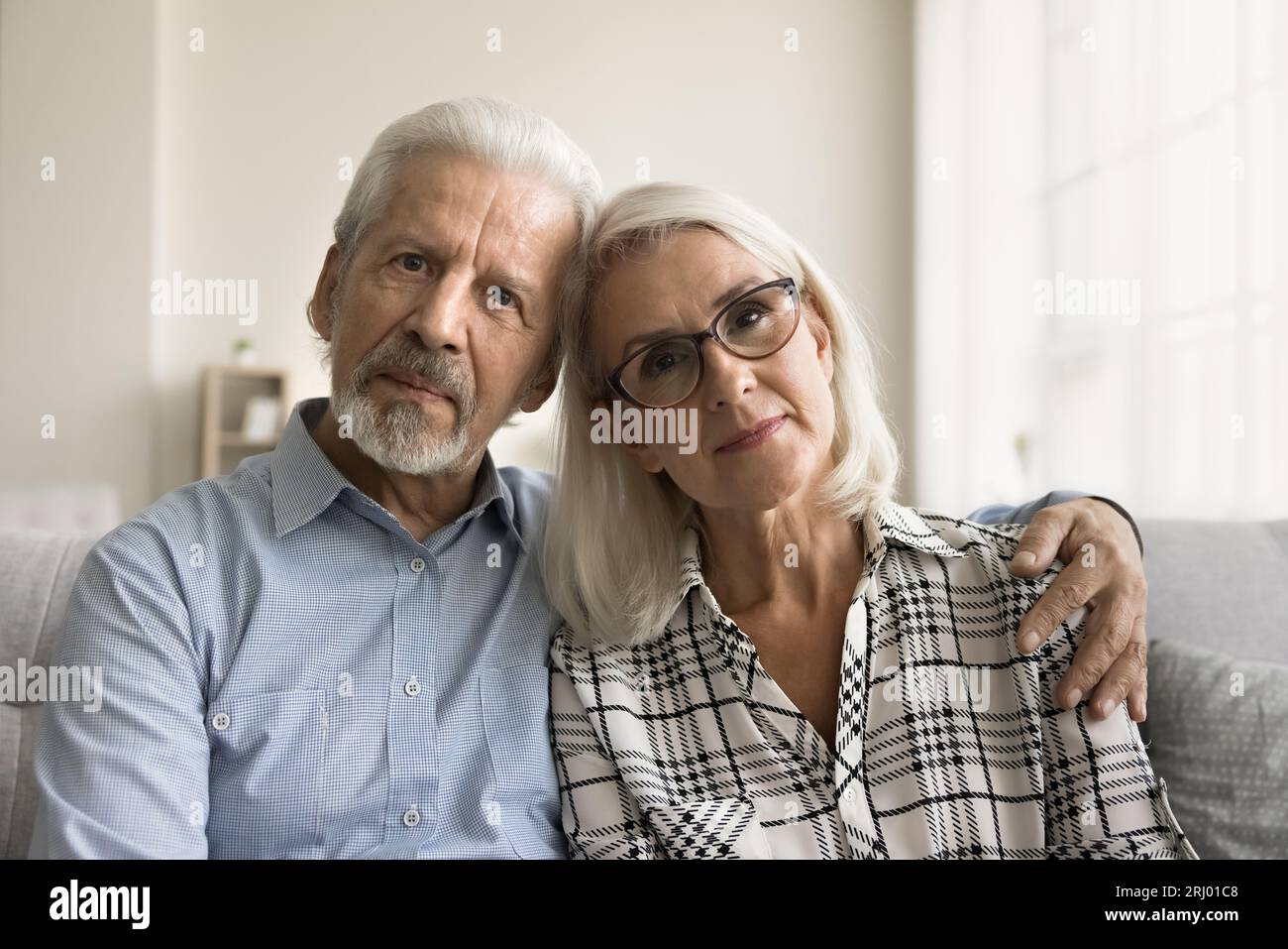 Serious senior old couple video call screen head shot portrait Stock ...