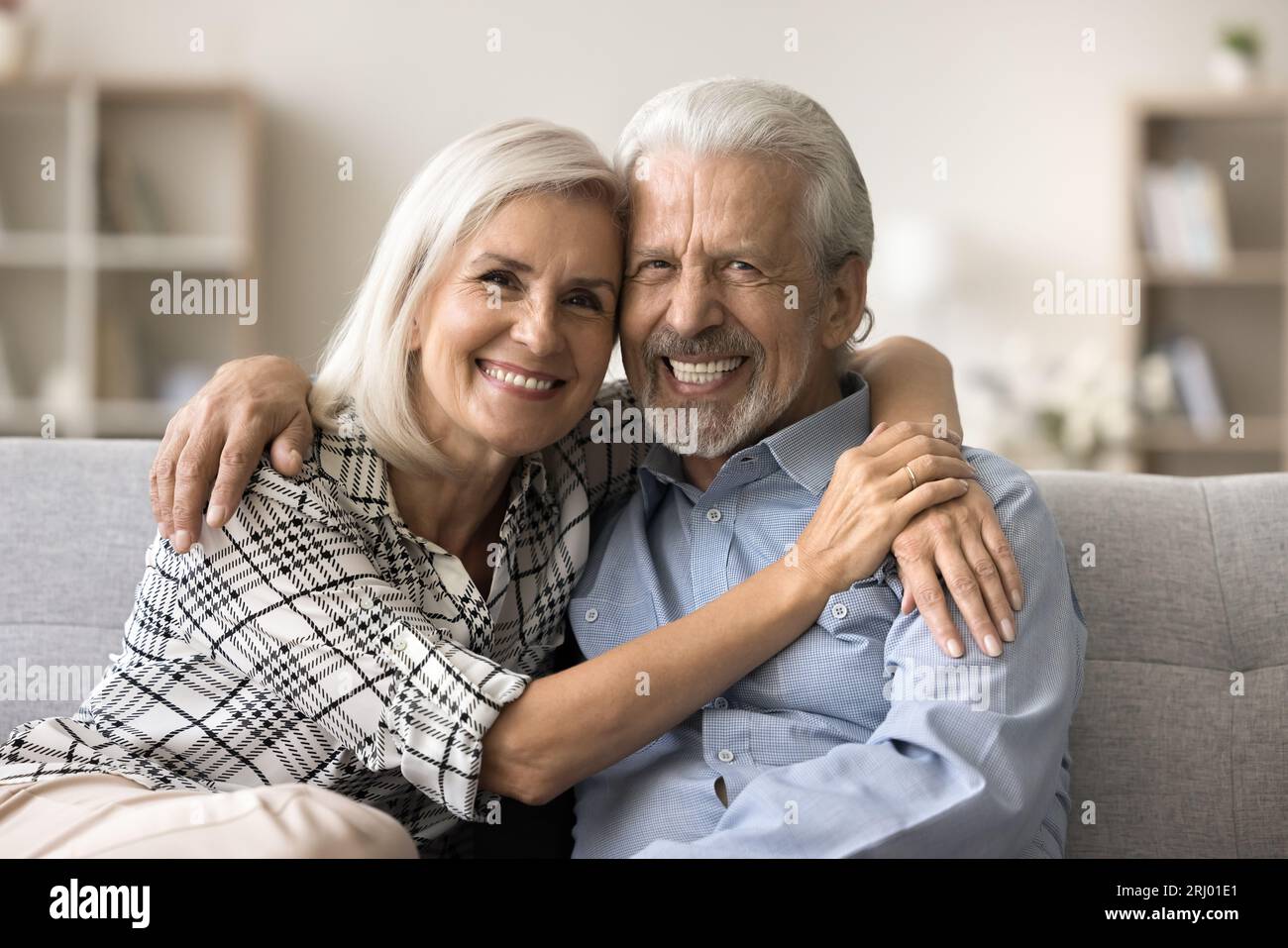 Happy older retired couple in love posing for family portrait Stock ...