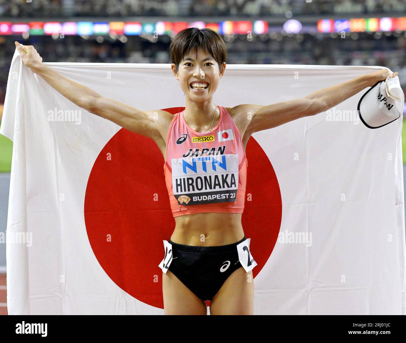 Ririka Hironaka of Japan poses for a photo with her country's national ...