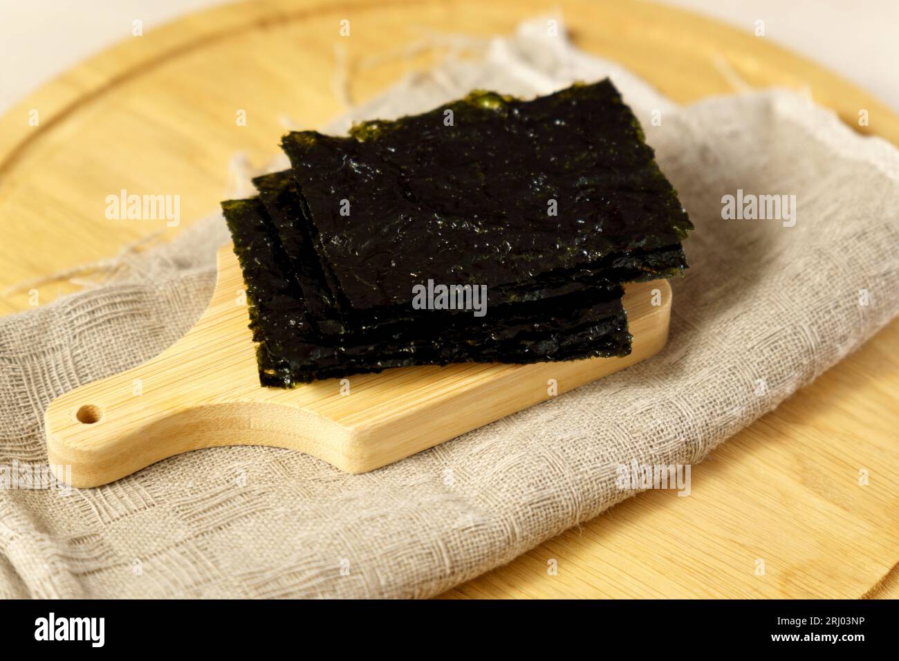 Crispy dried seaweed nori with salt. Healthy snack. Selective focus ...