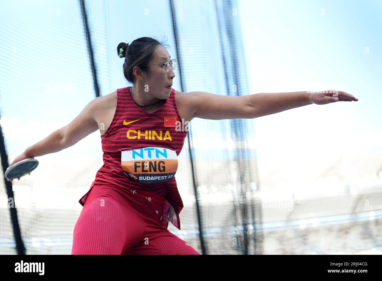 Bin Feng, of China, prepares to throw in the Women's-Discus ...