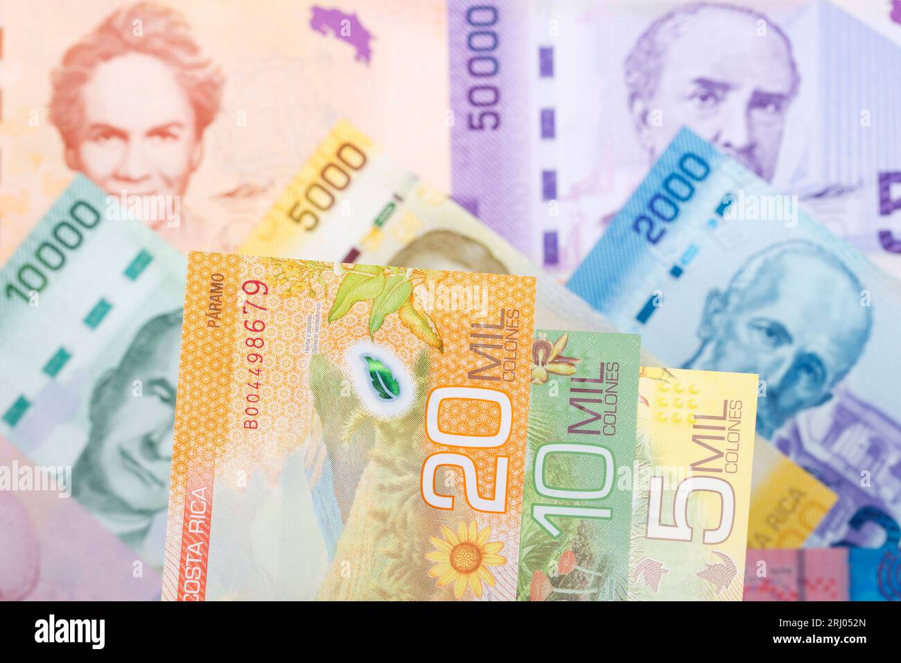 Costa Rican money - Colones a business background Stock Photo - Alamy