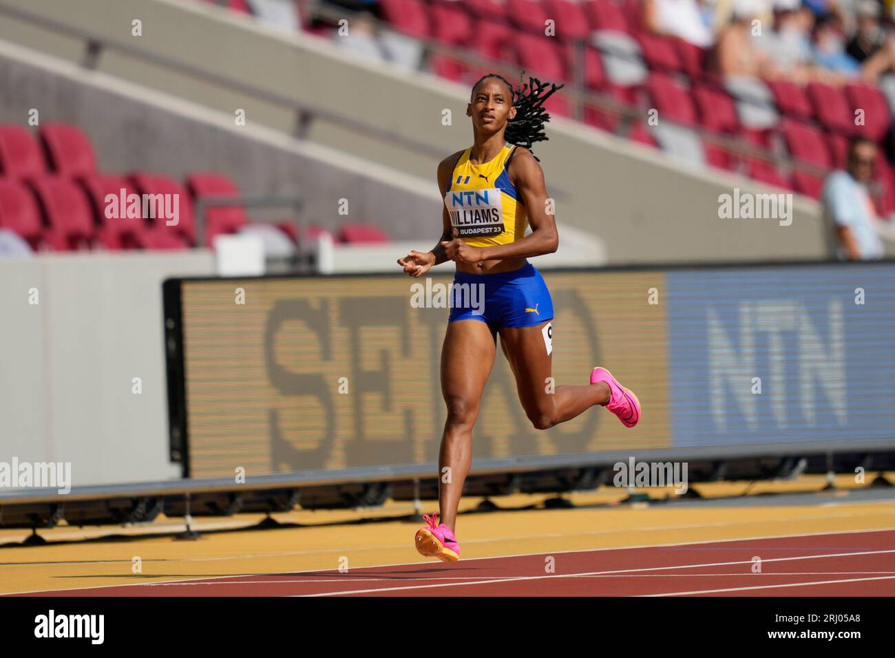 Sada Williams, of Barbados, competes in the Women's 400-meters heat ...