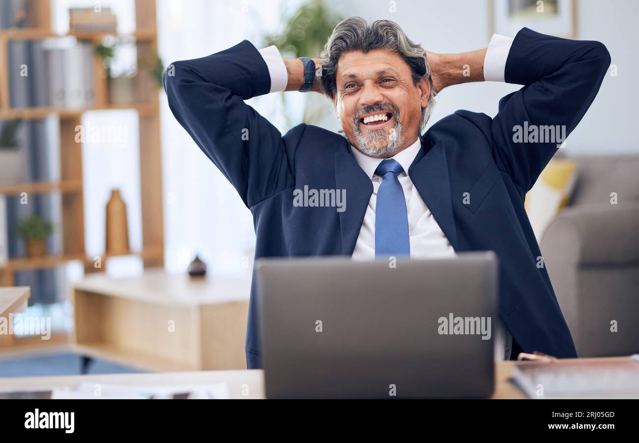 Business, relax and man with a laptop, smile and finance with ...