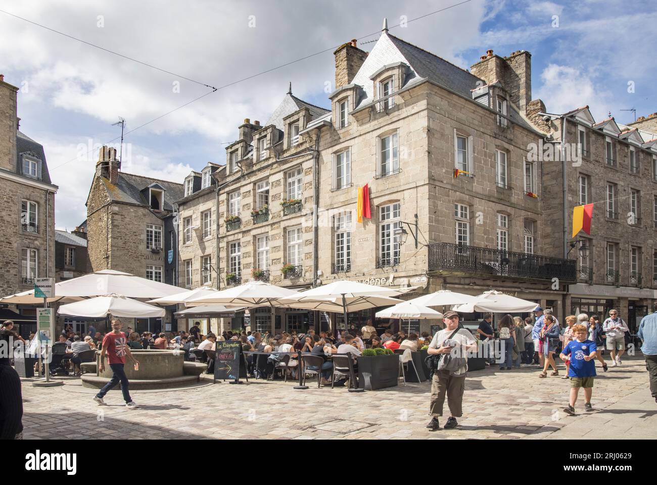 cafe bars and fine old buildings in the town of dinan brittany Stock ...