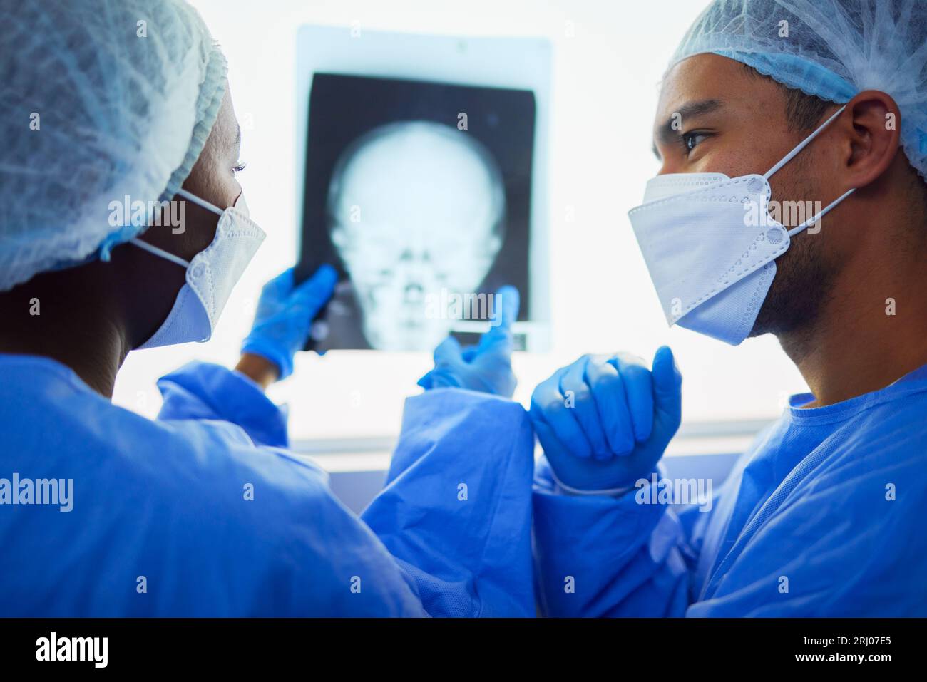 Skull xray, doctors and medical discussion for planning test results ...