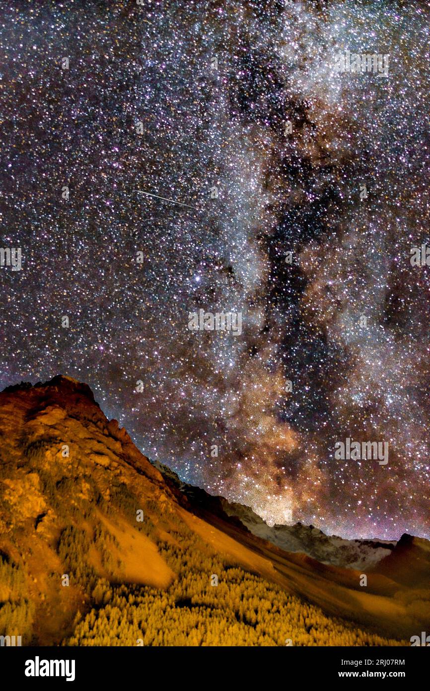 Starry night sky over the mountain area in Central Europe with the ...