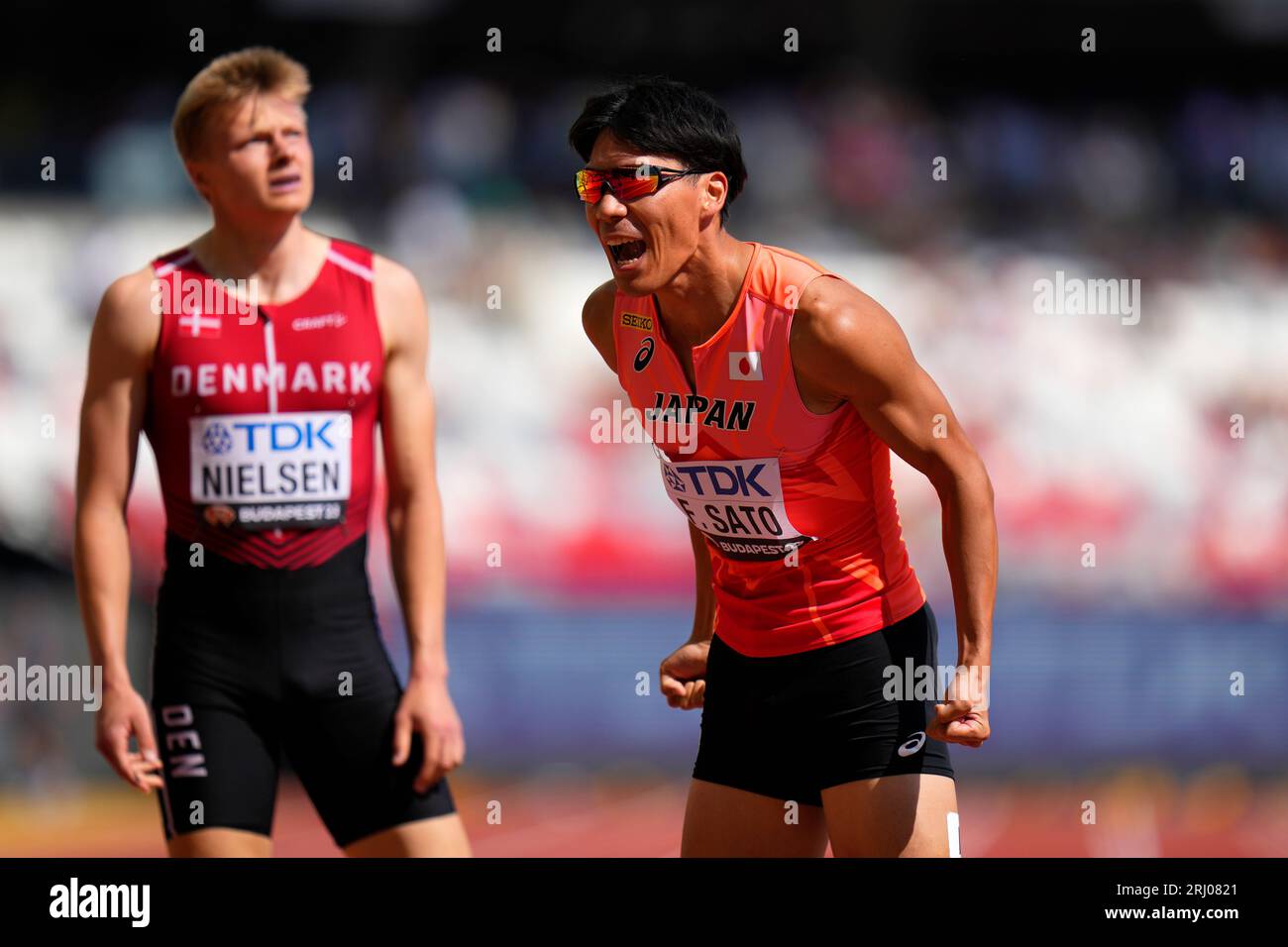 Fuga Sato, of Japan reacts after finishing a men's 400-meters heat ...