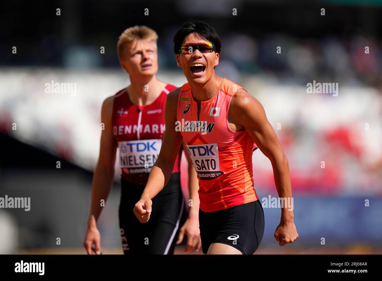 Fuga Sato, of Japan reacts after finishing a men's 400-meters heat ...