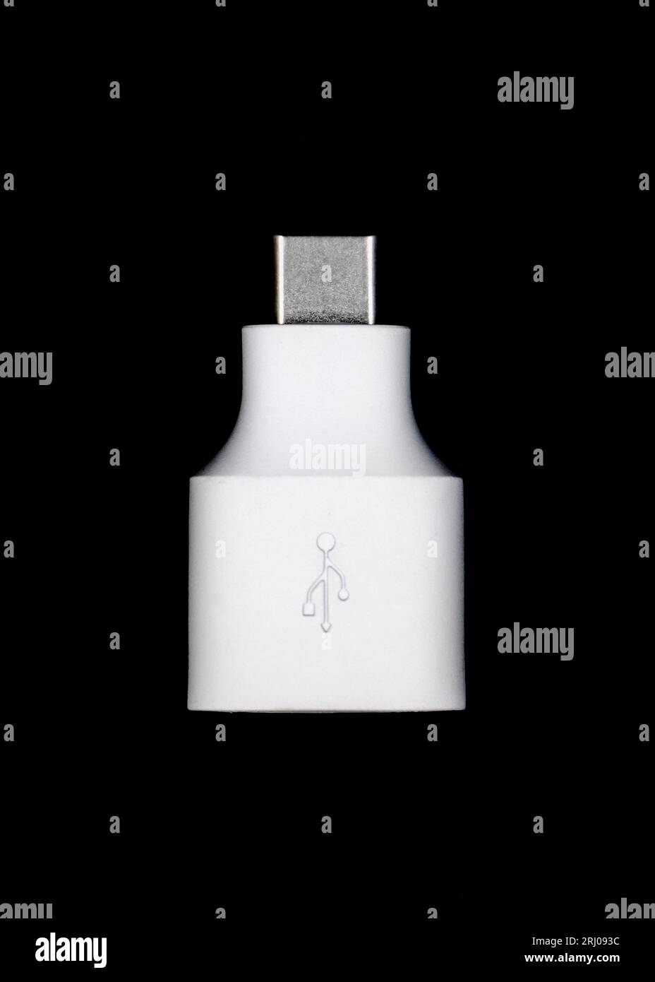 a white male to female USB adapter with a type C host pin used to ...