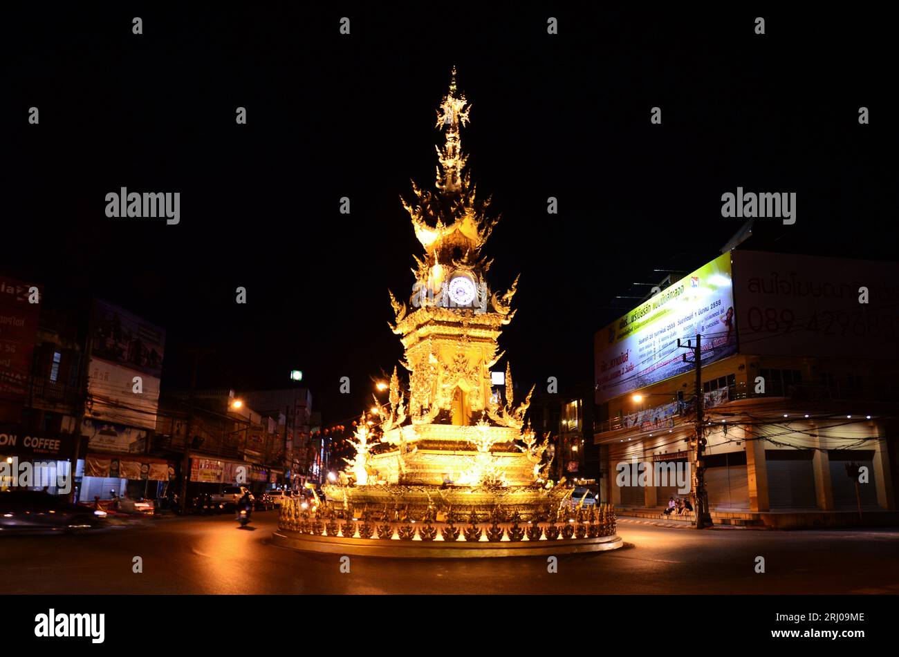 Landscape cityscape and traffic road at roundabout circle golden clock ...