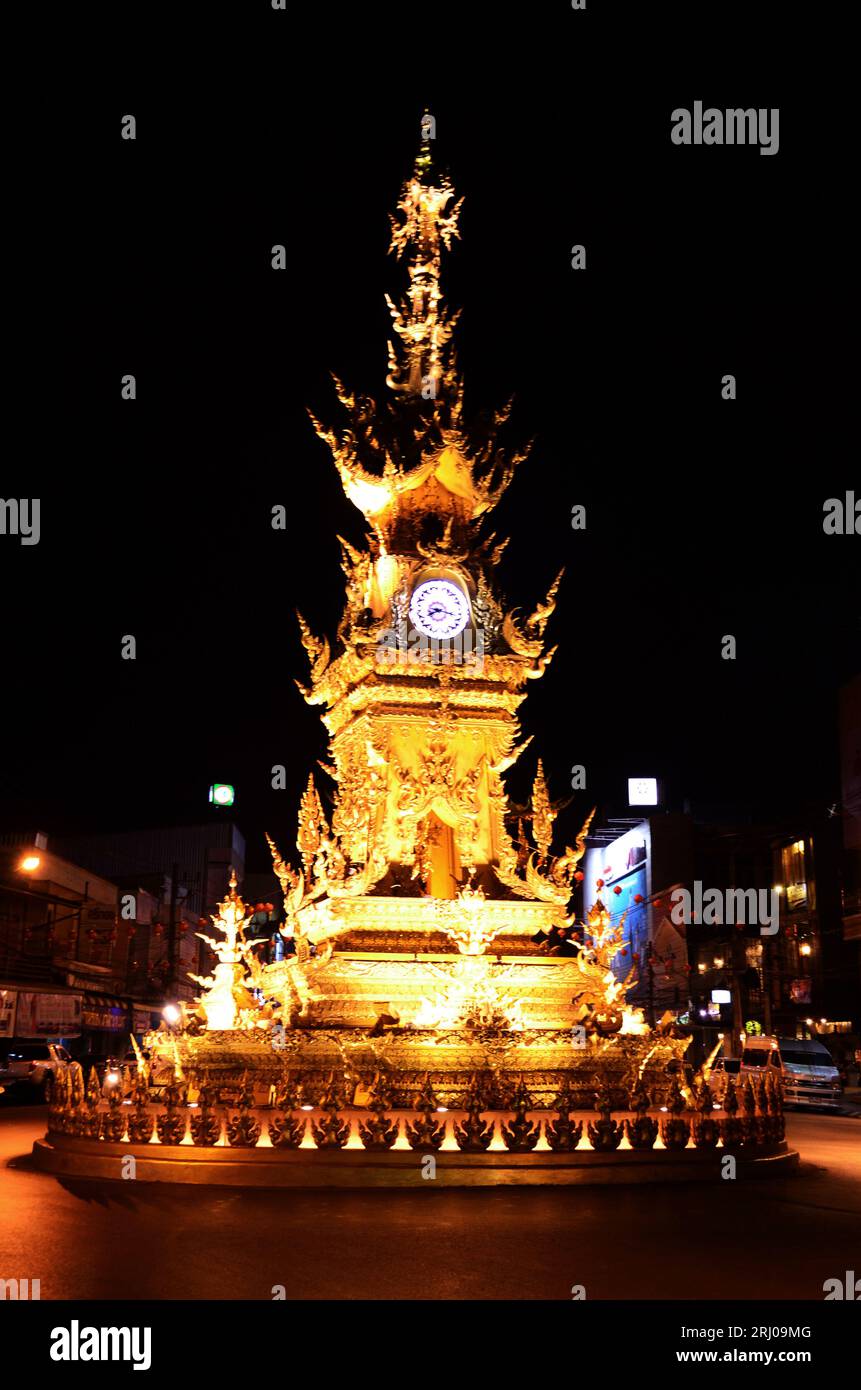 Landscape cityscape and traffic road at roundabout circle golden clock ...
