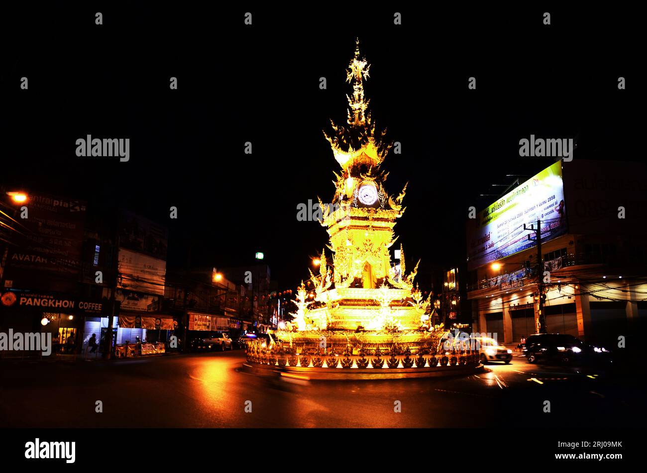 Landscape cityscape and traffic road at roundabout circle golden clock ...