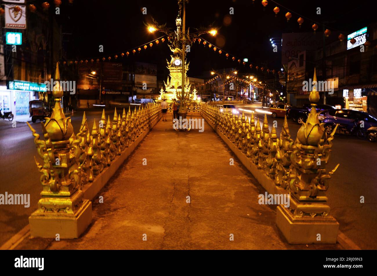 Landscape cityscape and traffic road at roundabout circle golden clock ...