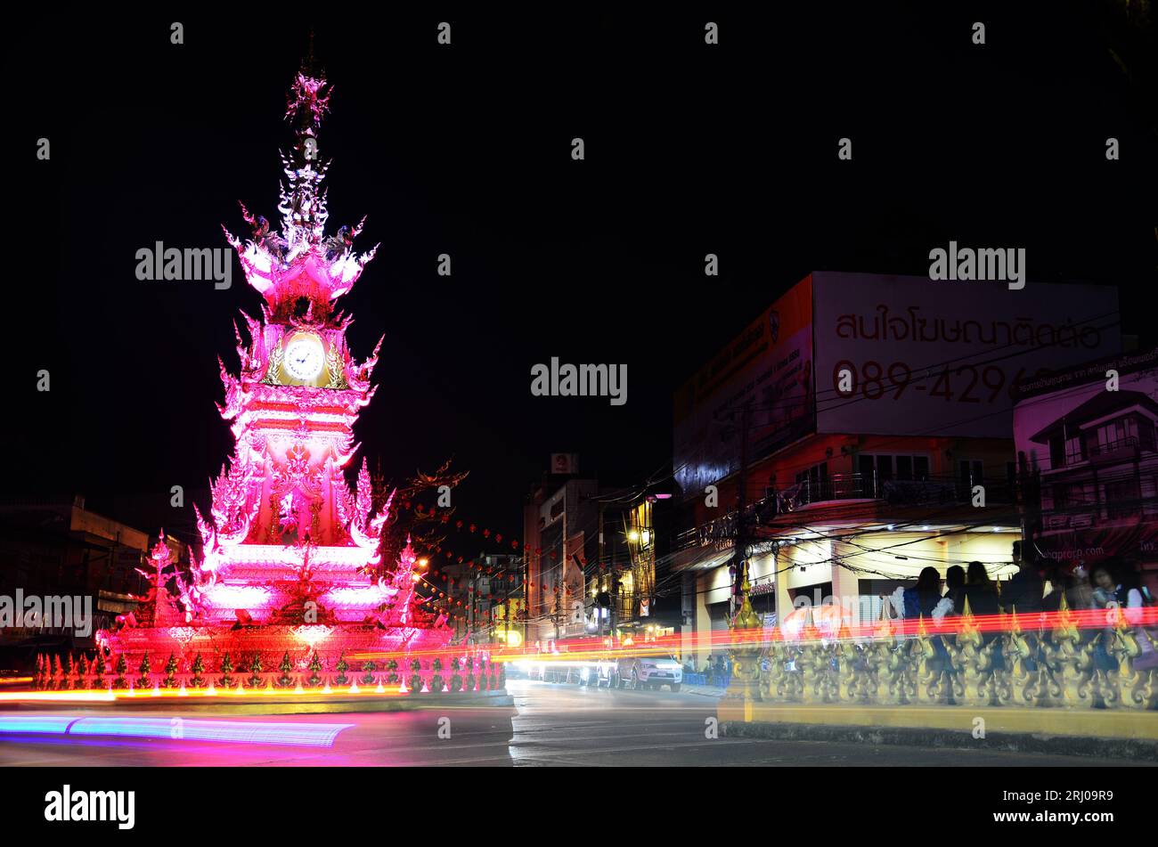 Landscape cityscape and traffic road at roundabout circle golden clock ...