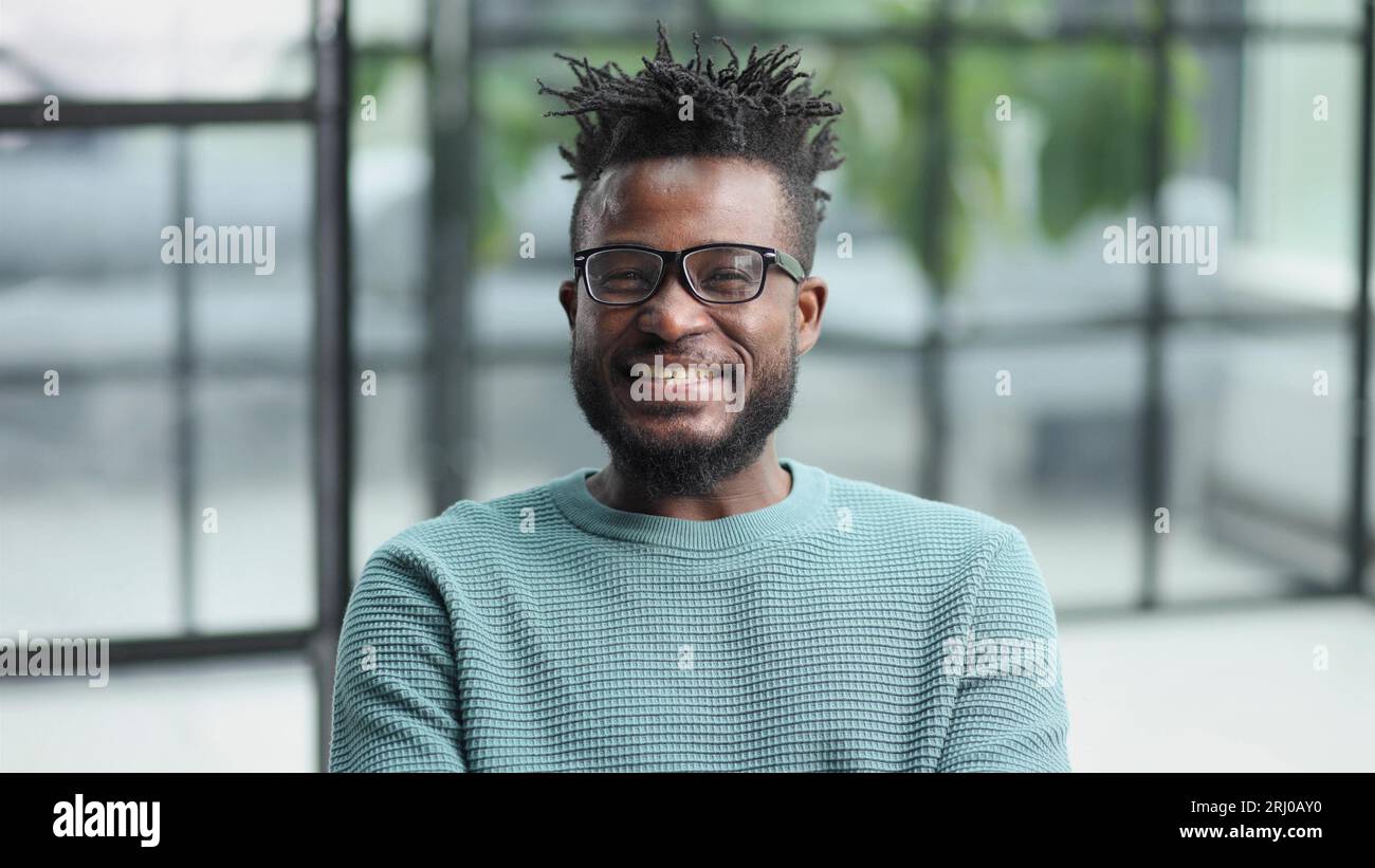 Handsome young man wondering in hi-res stock photography and images - Alamy