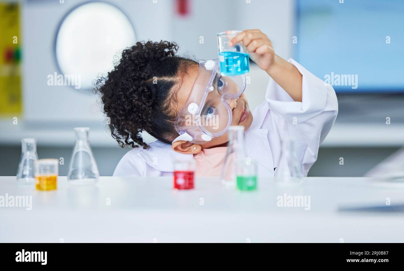 Science, learning and research with child in laboratory for experiment ...