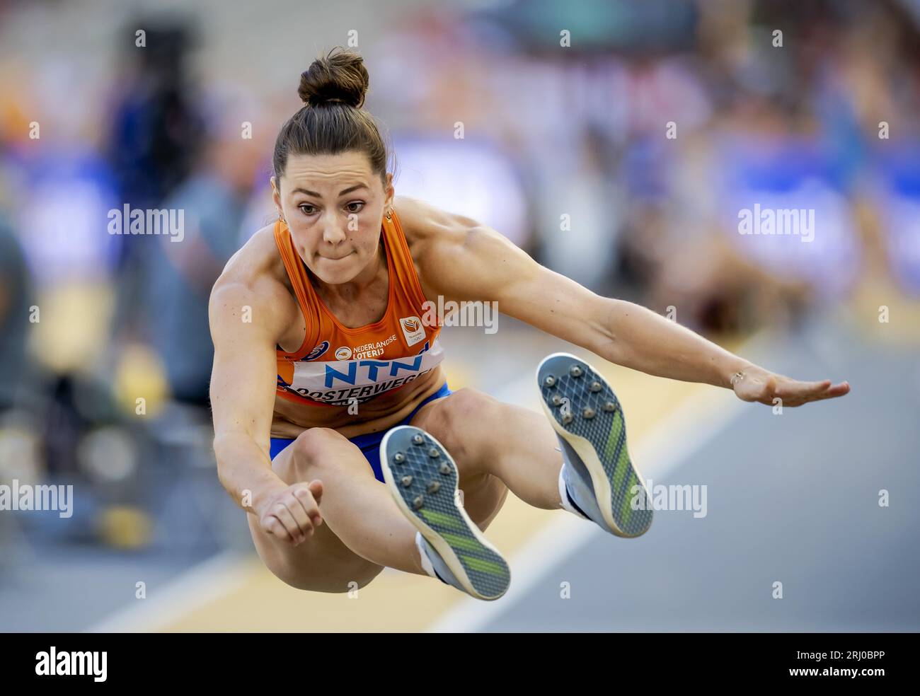 BUDAPEST - Emma Oosterwegel in action in the heptathlon long jump ...