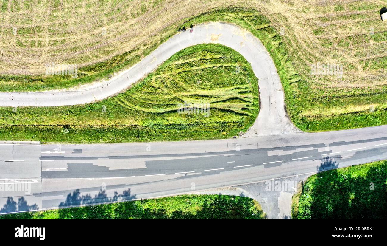 Vertical aerial view of an arched turnoff on a paved bike path Stock ...