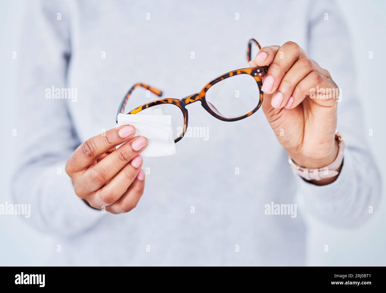 Hands, cleaning lens and glasses, hygiene and vision with eye care and ...