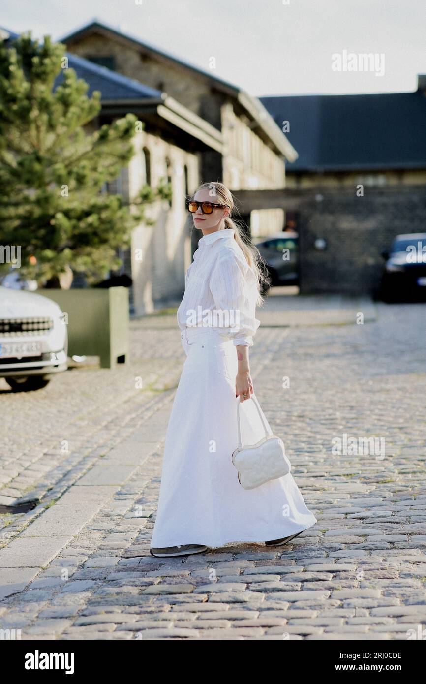 Street style, Tine Andrea arriving at Ganni Spring-Summer 2024 show ...
