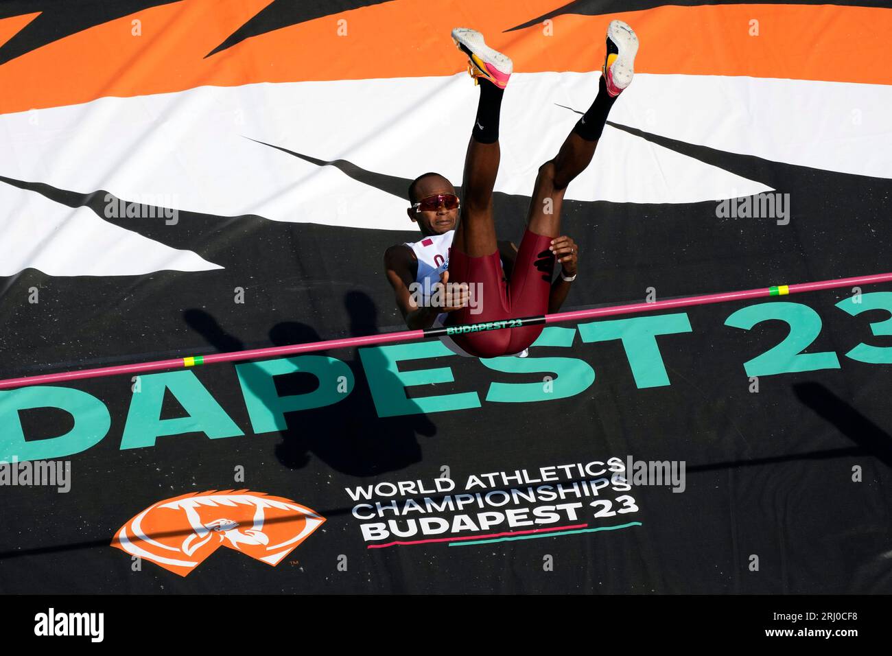 Mutaz Essa Barshim, of Qatar, clears the bar while competing in the Men ...