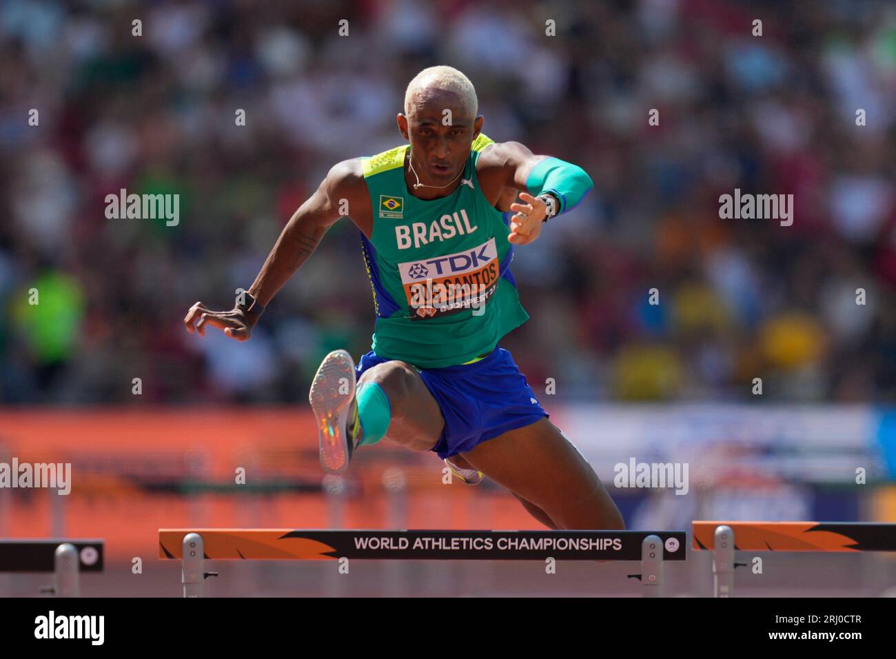 Alison Dos Santos, of Brazil, competes in the Men's 400-meters hurdles ...