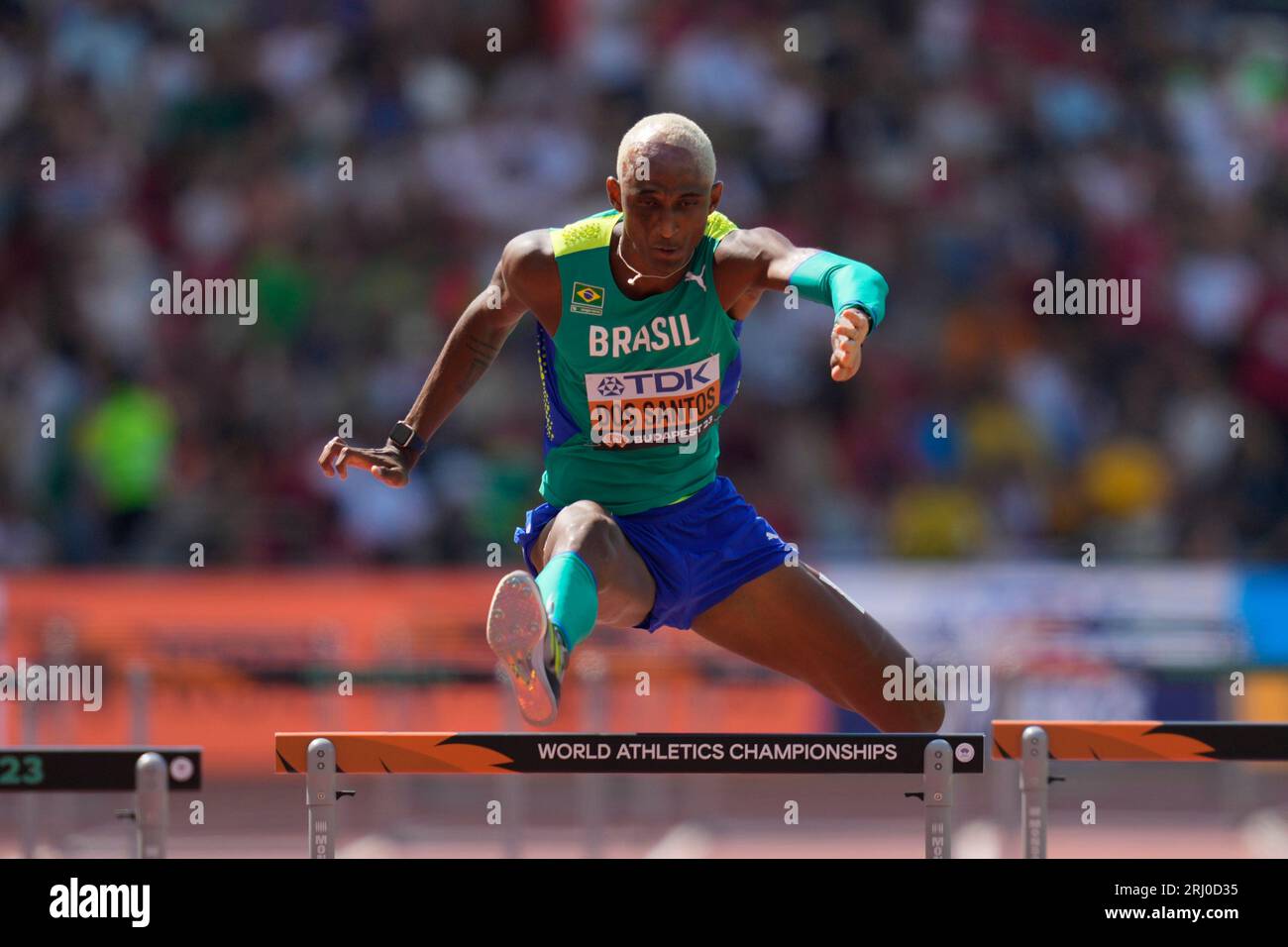 Alison Dos Santos, of Brazil, competes in the Men's 400-meters hurdles ...