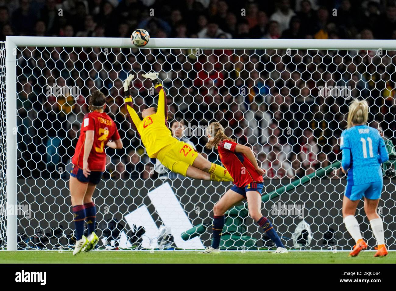 A shot from England's Lauren Hemp, right, hits the crossbar during the ...